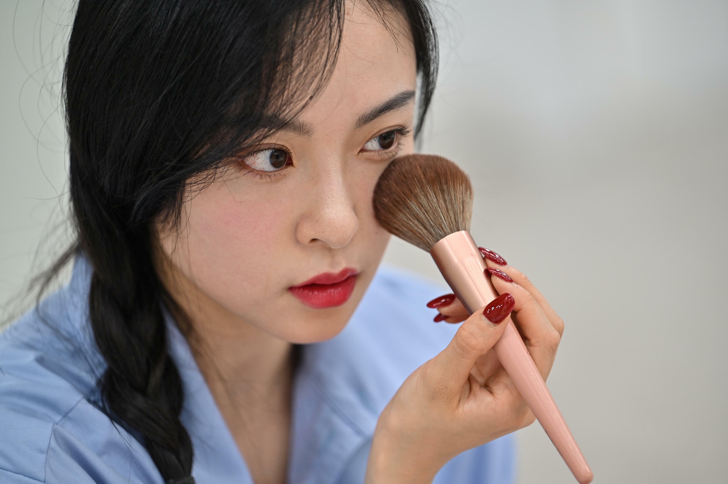 En Chine, les fans font profil bas face à la reprise en mains du monde ...