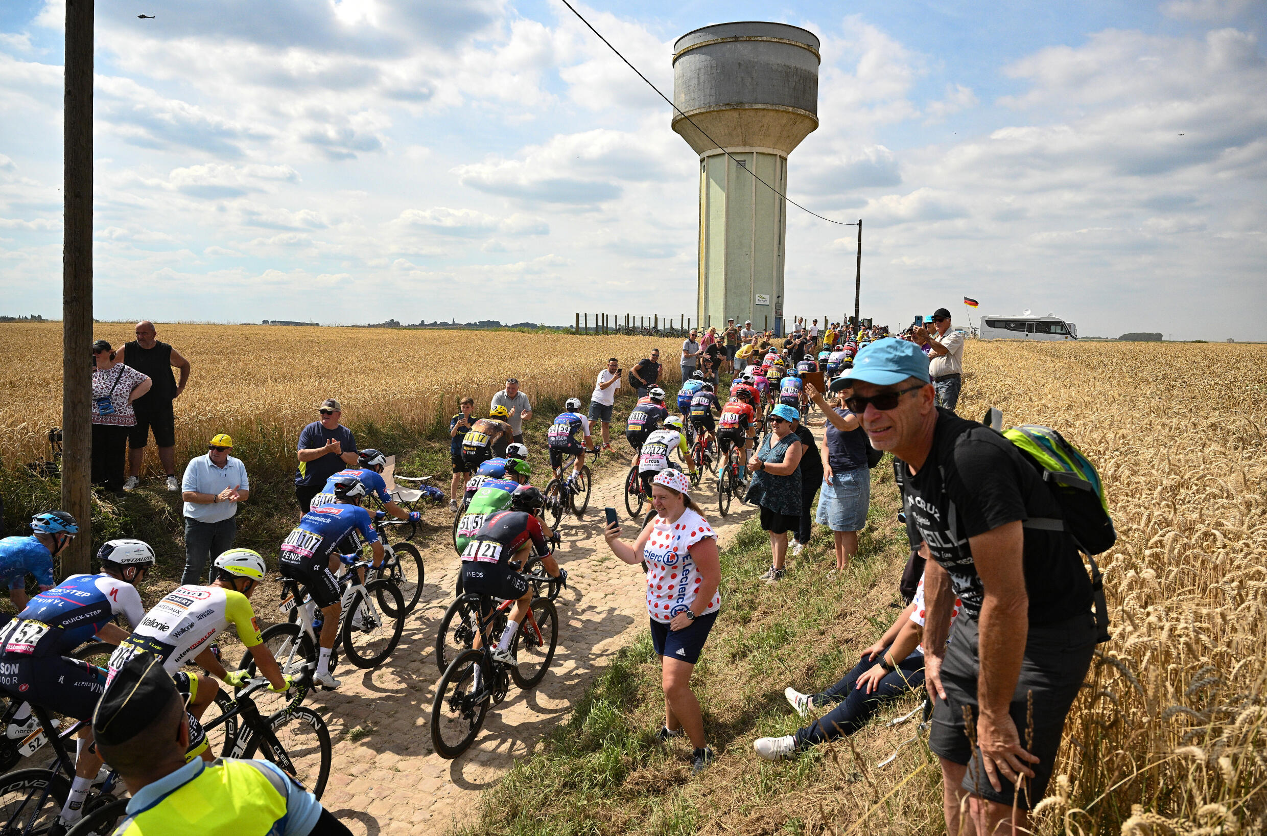 Cobble king Clarke wins Tour de France stage five with bike throw