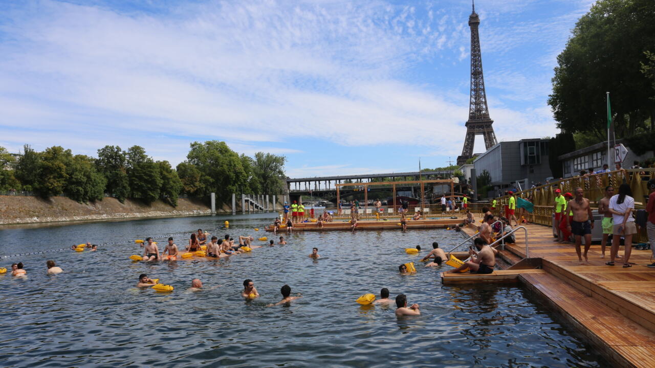In pictures: Parisians take their first dips in the Seine in more than ...