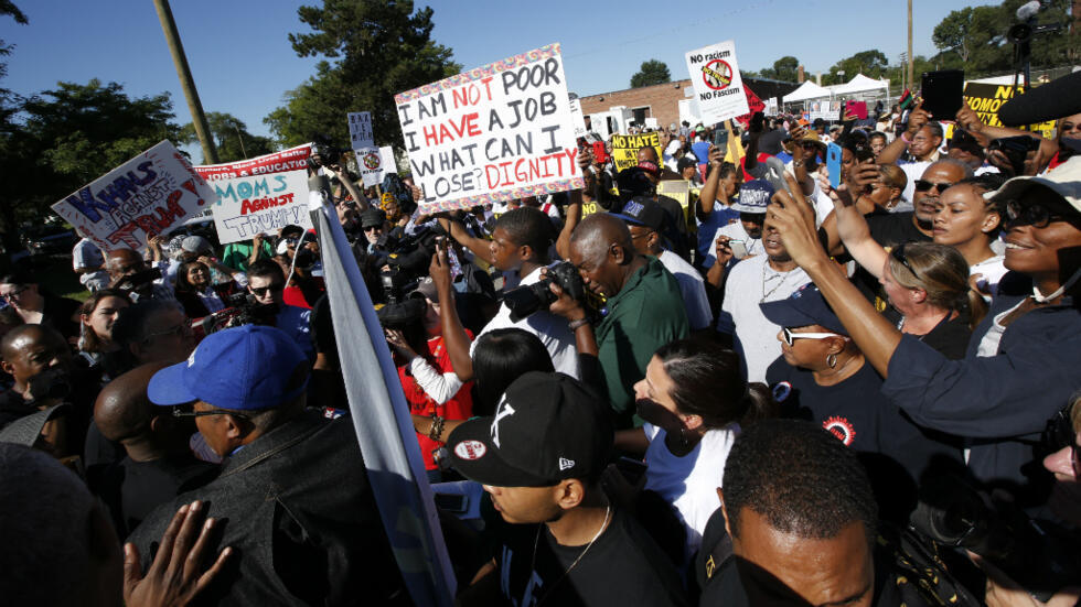 Trump woos black voters with church visit, calls for 'civil rights agenda'