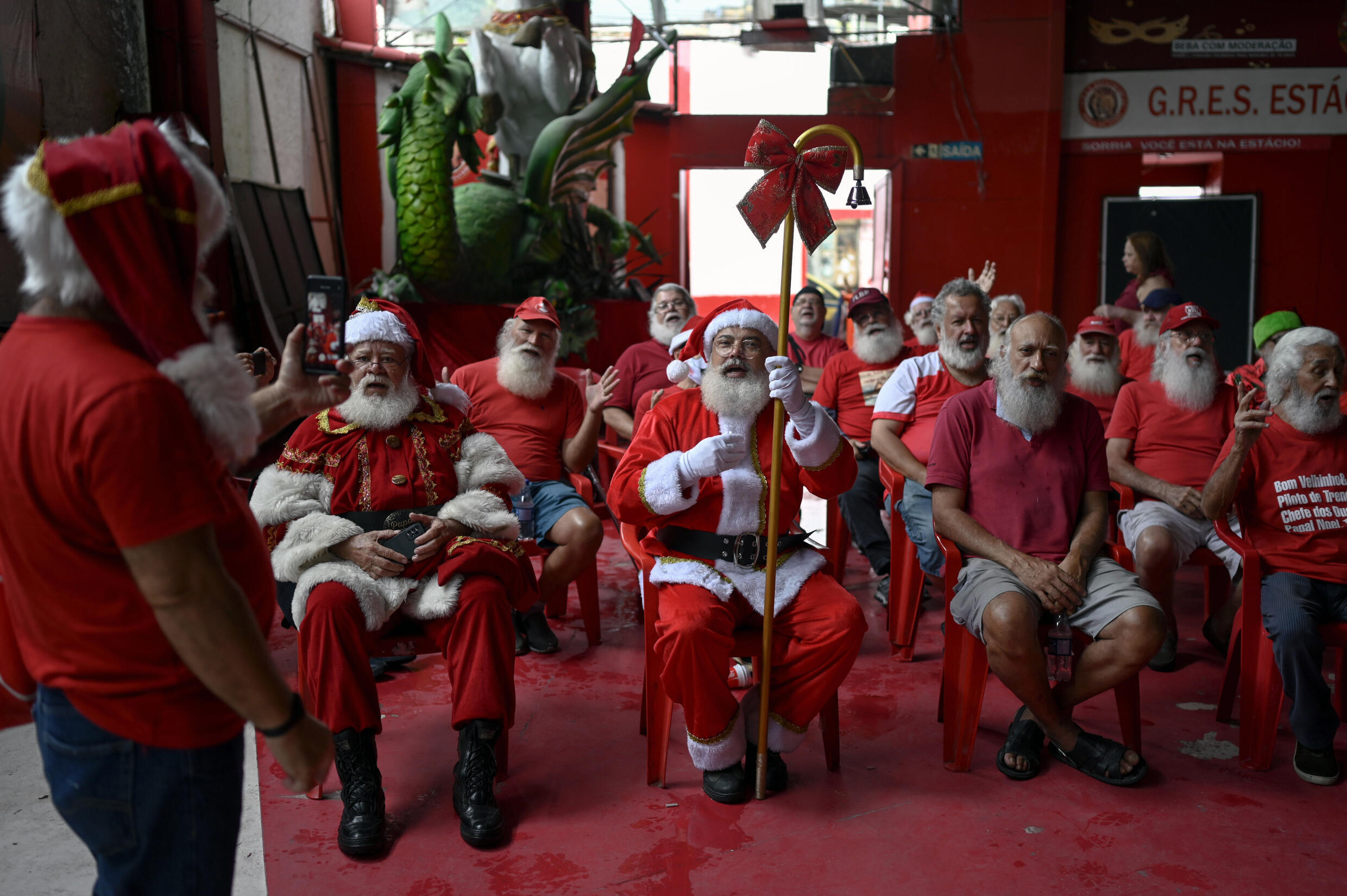 Lean times: Rio Santas line up for nourishing gifts. For themselves