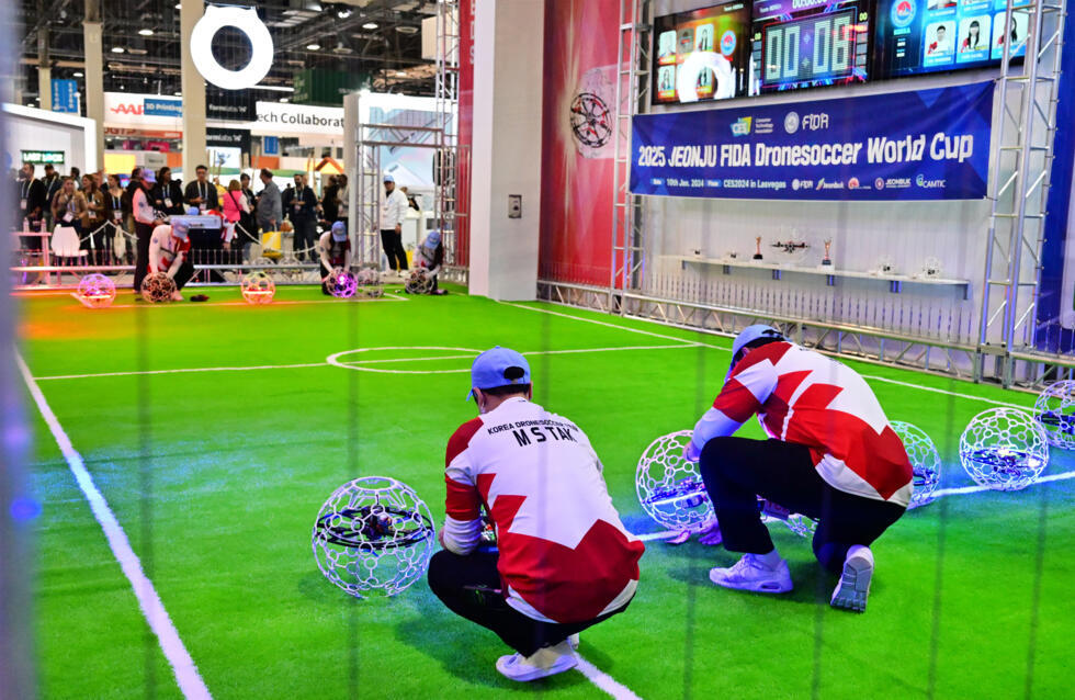 Buzz, bump, goal! Drone soccer aims high at CES