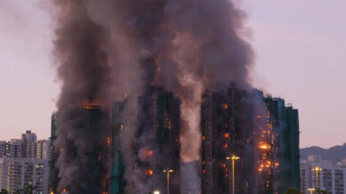 Fire engulfs Hong Kong residential blocks, killing at least four