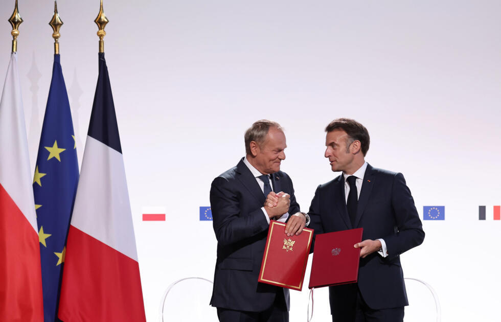 France, Poland sign treaty with mutual defence pledge