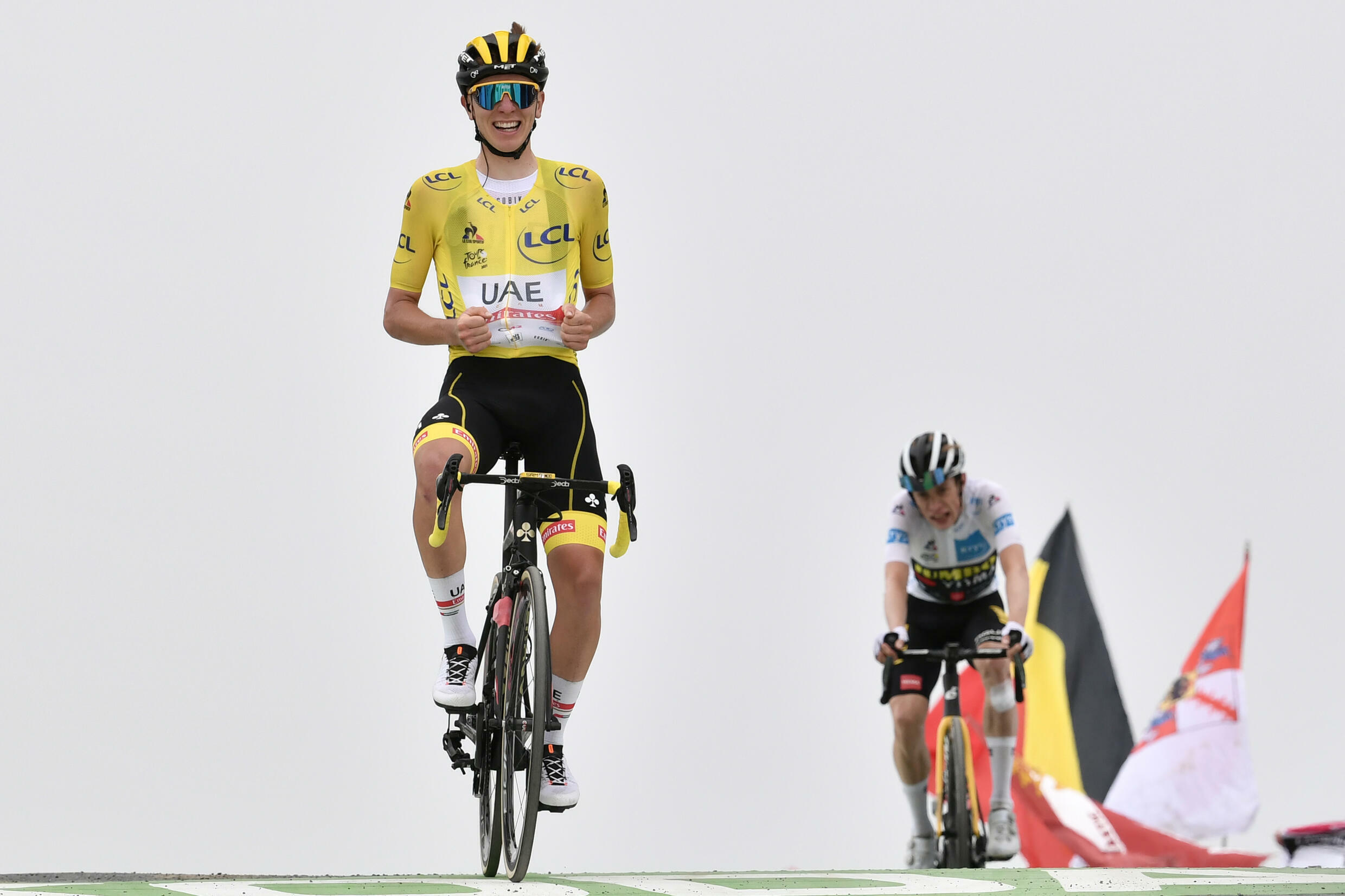 Champion Pogacar triumphs on Tour de France mountain - France 24