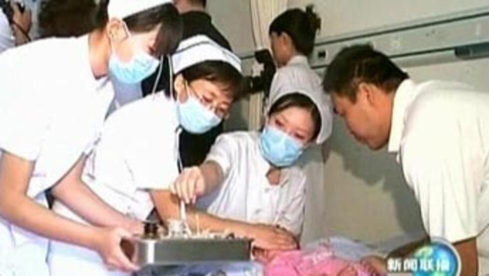 Chinese authorities expand melamine tests after baby-milk scandal