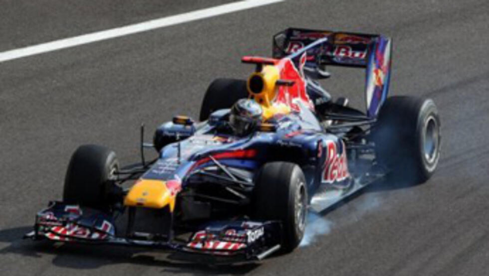 Vettel gives Red Bull a boost with pole position at Abu Dhabi