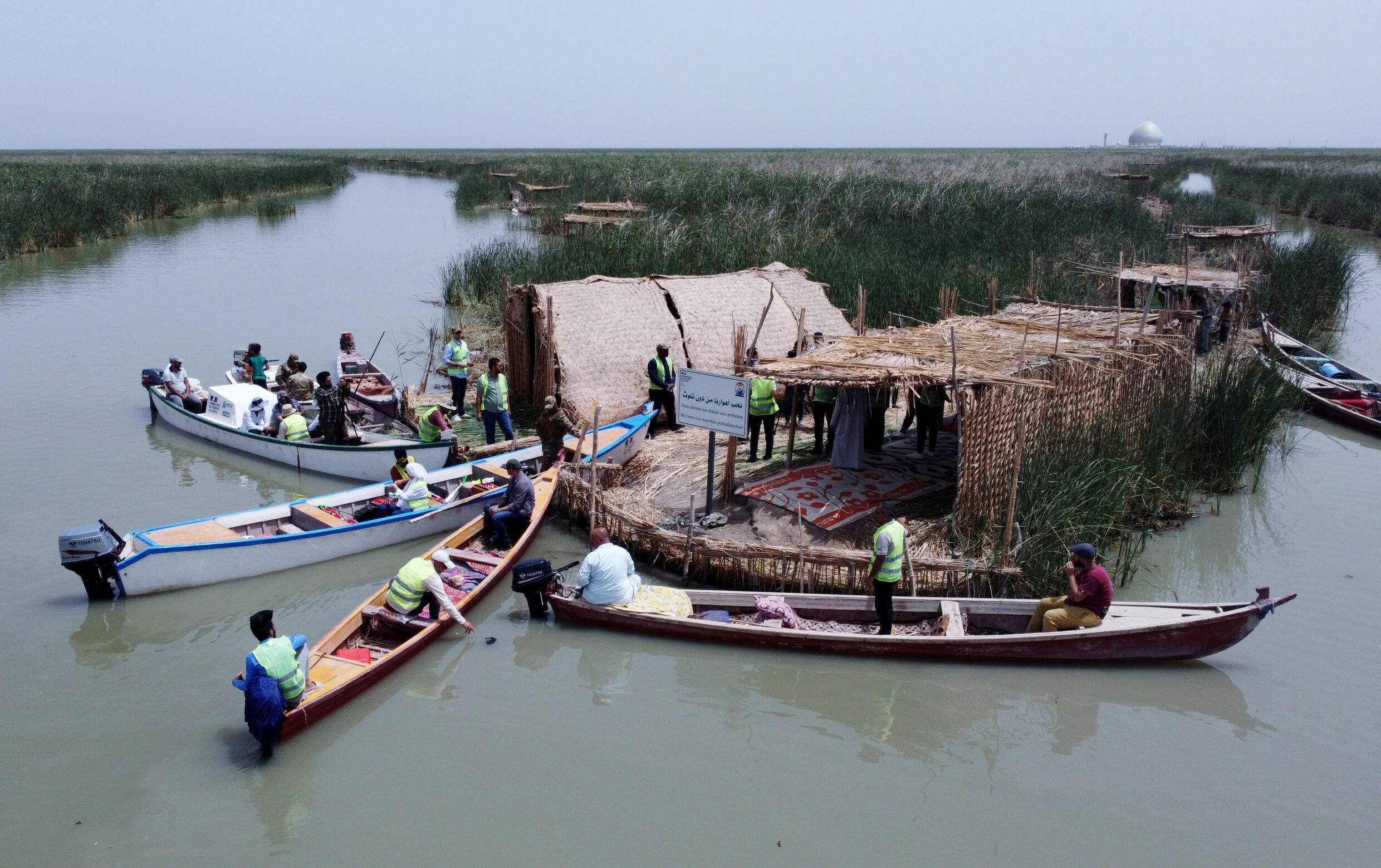 Trawling Iraq's threatened marshes to collect plastic waste