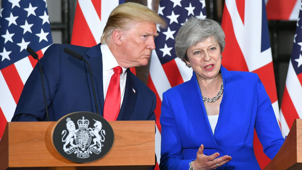 Making nice at end, Trump praises outgoing May