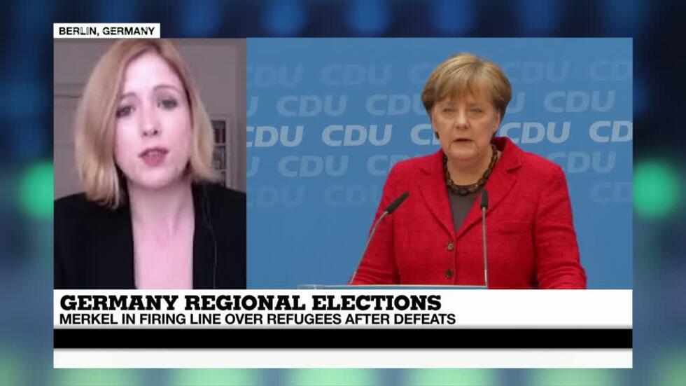 Germany's Merkel suffers election setback after nationalist surge