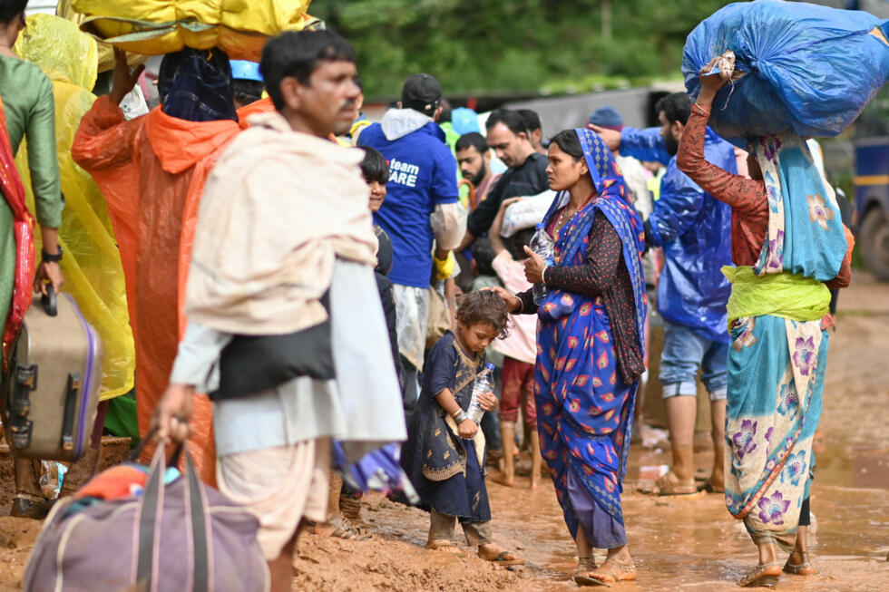 India landslide toll hits 160 as rain hampers rescue work