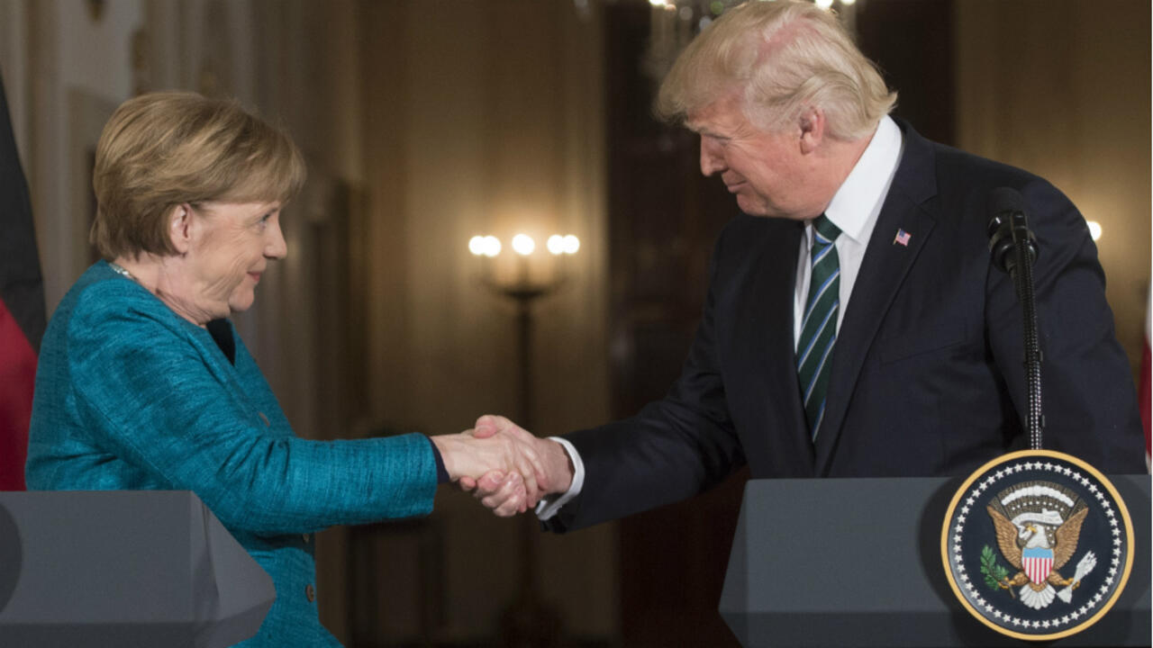 Trump presses Merkel on NATO spending as he backs Alliance at first ...
