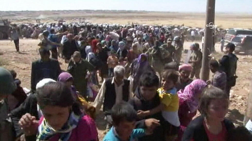 IS militant advance sends 70,000 Syrian Kurds fleeing to Turkey