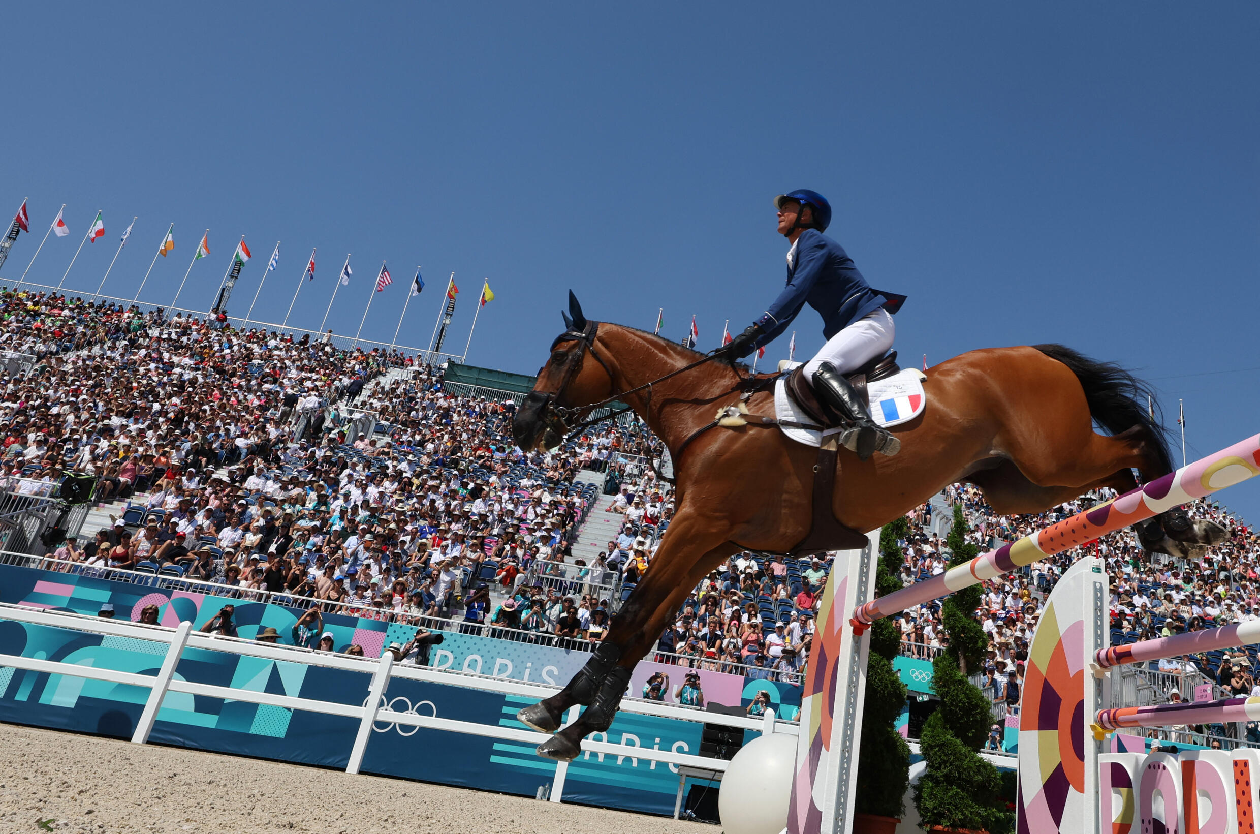 Time warp: Olympic equestrians make history in Versailles' lavish grounds