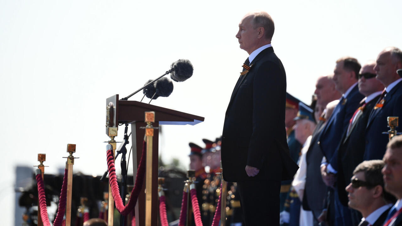 Putin reviews Red Square military parade on eve of constitutional vote
