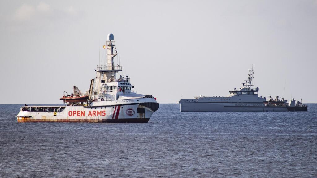 Stranded migrant rescue ship Open Arms refuses to leave Italian waters