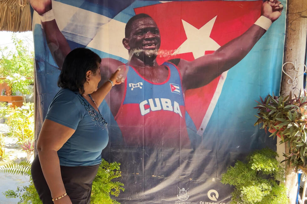 In Cuba, wrestler Lopez's hometown cheers historic Olympic gold