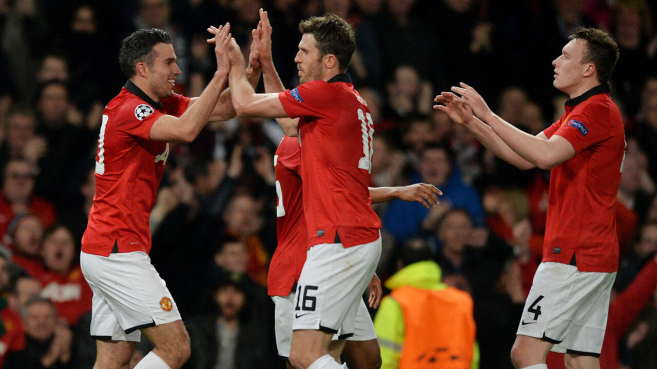 Man United fight back to reach Champions League quarters
