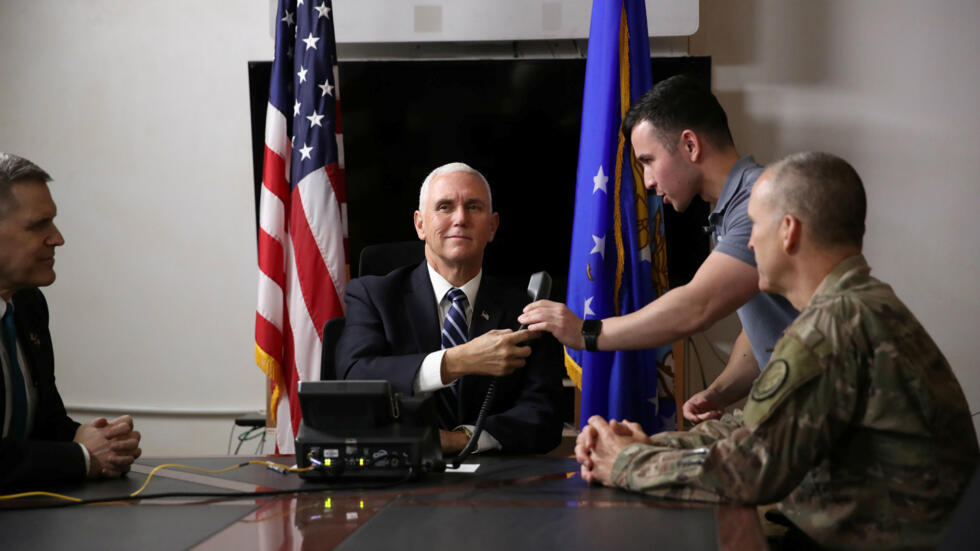 Mike Pence makes surprise visit to Iraq as deadly violence continues