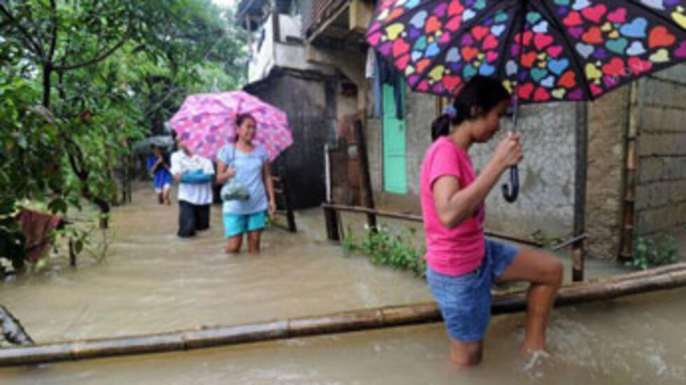 Half of Manila under water as floods paralyse capital