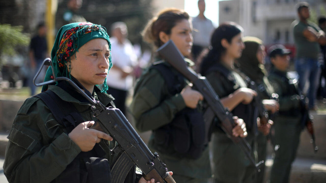 Kurdish forces pull back from Syrian-Turkish border