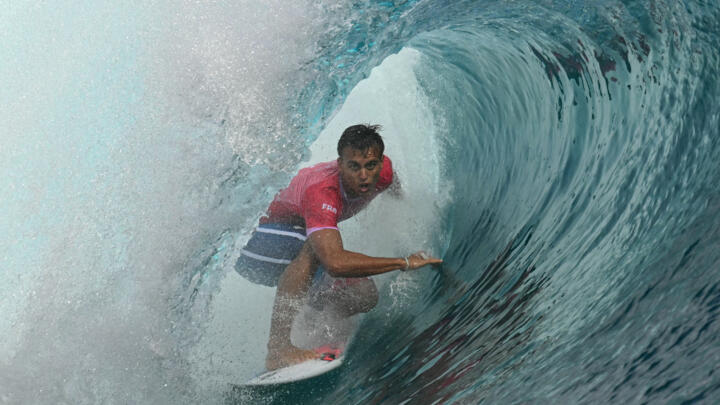 Local hero Kauli Vaast wins Olympic surfing gold in French Polynesia