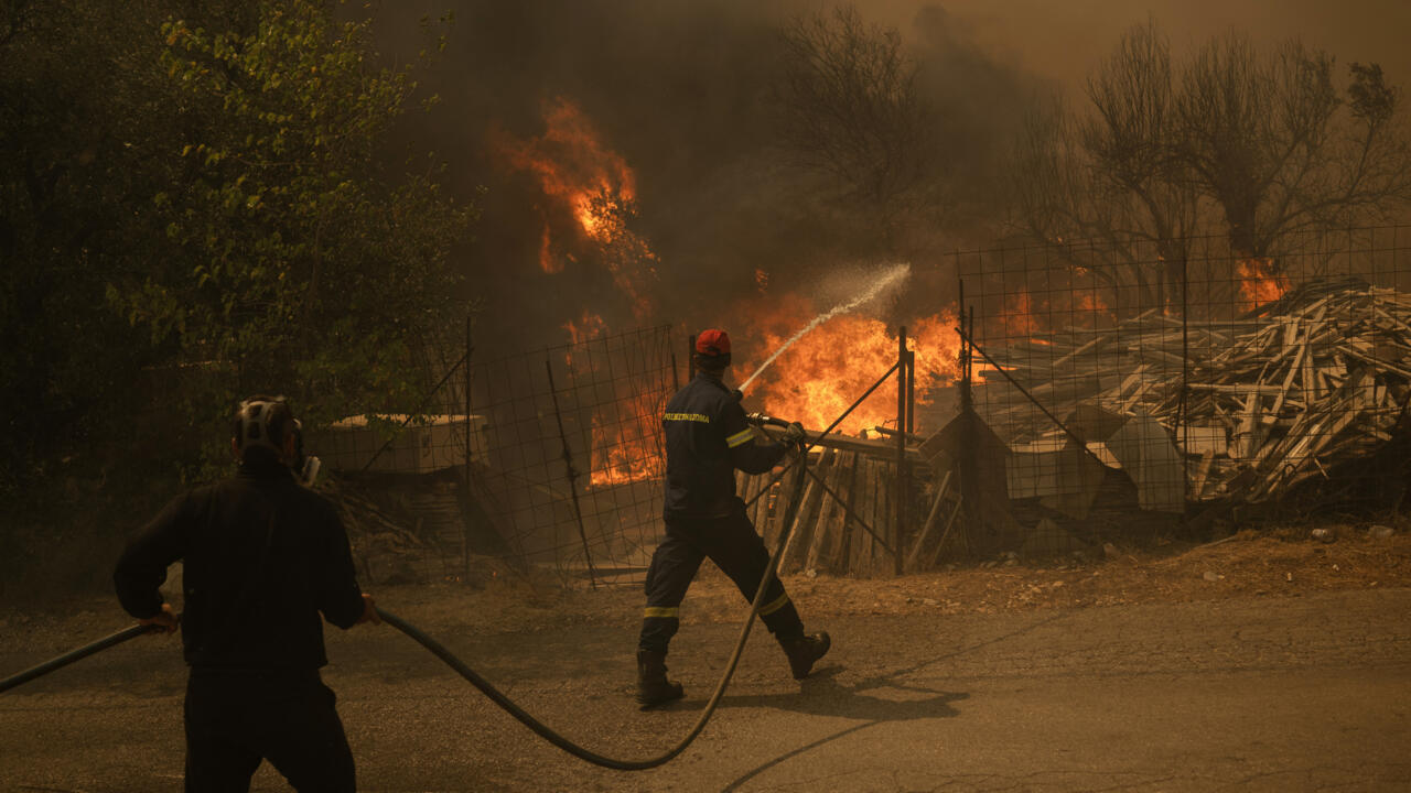 Greece asks EU for help as wildfires near Athens suburbs