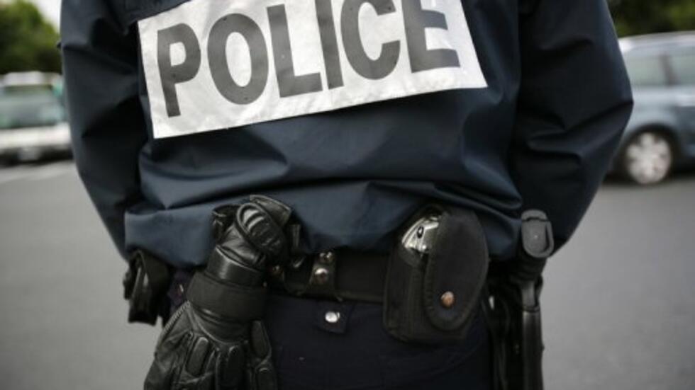 One dead, 11 arrested in French anti-terror raids