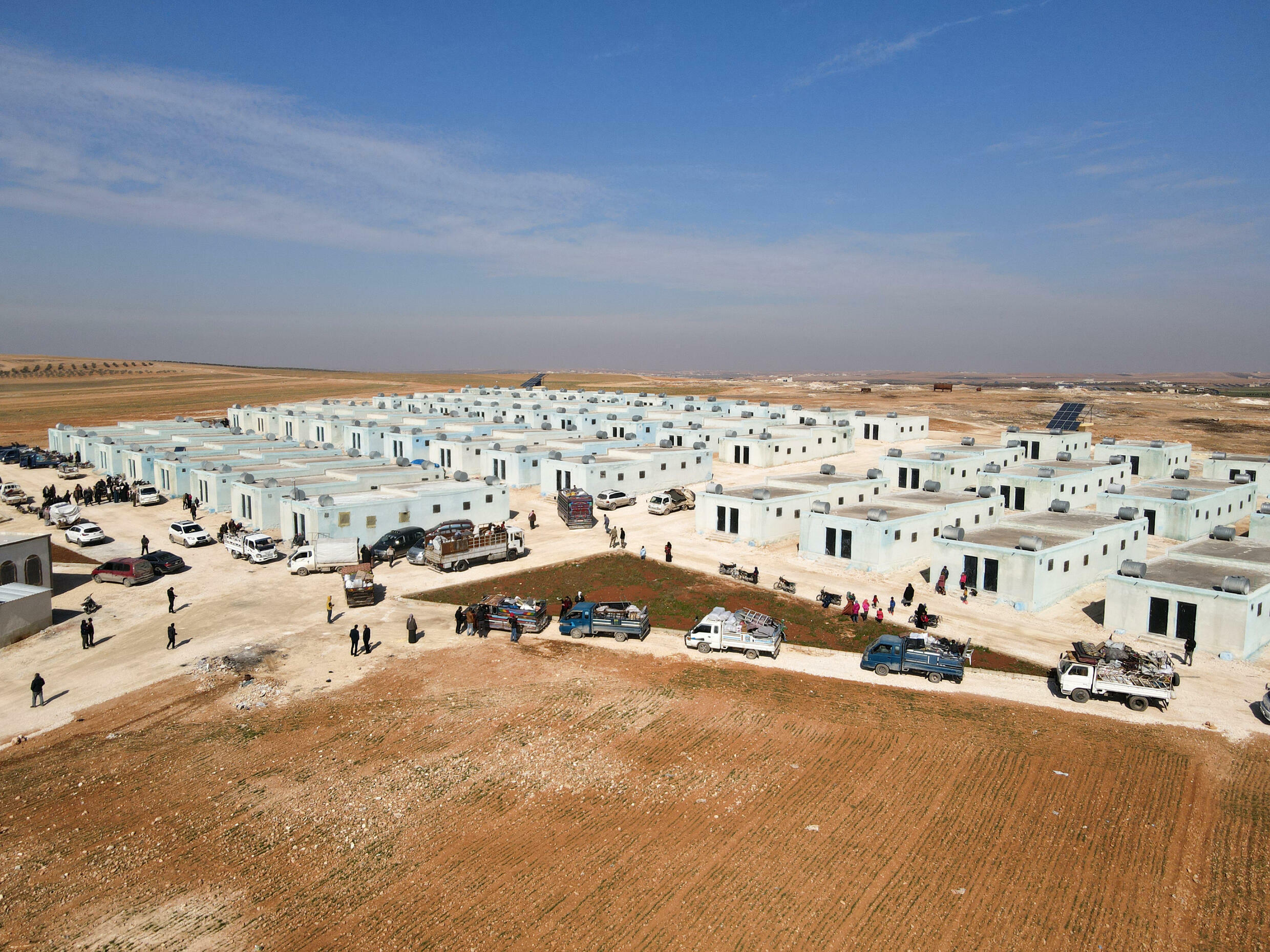 In Turkish-funded Syria camps, tents give way to homes