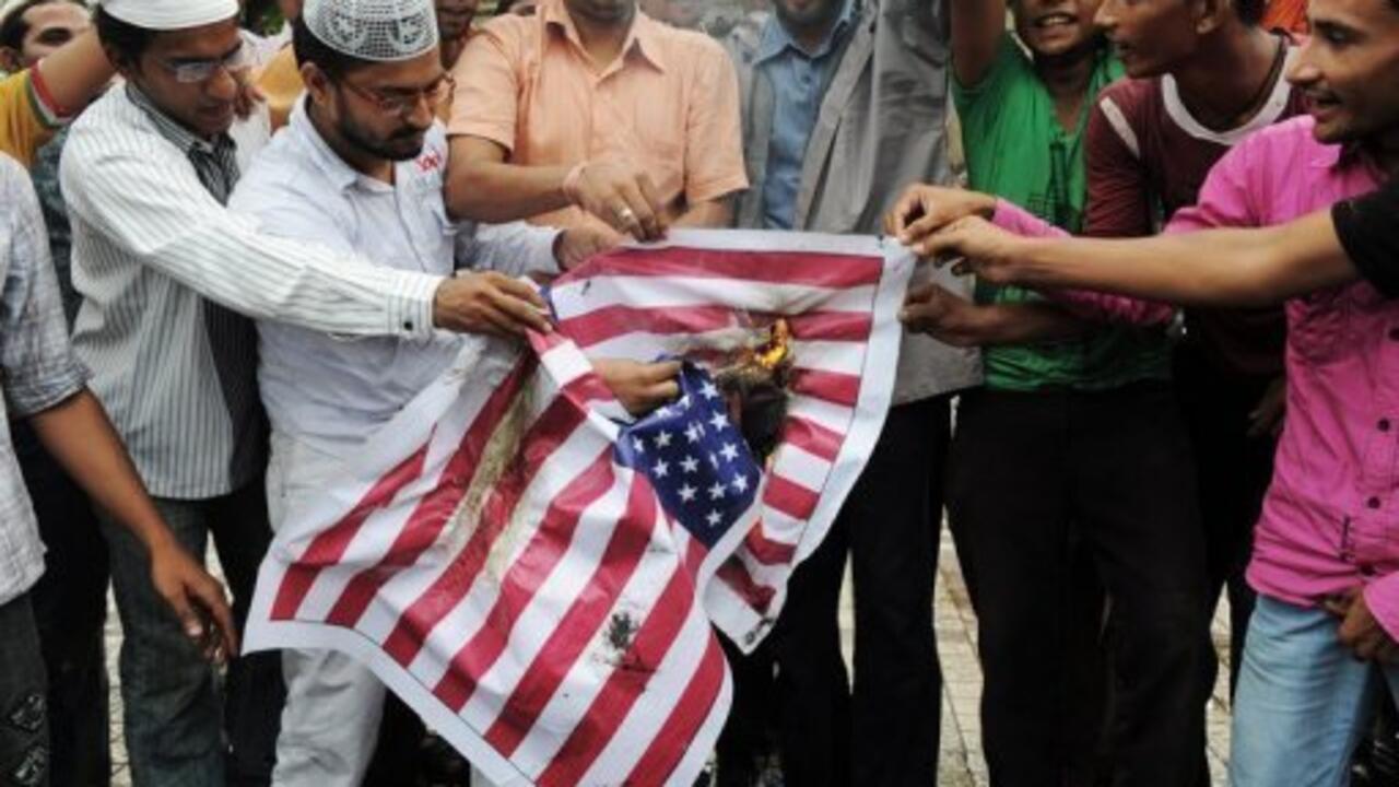 Thousands protest over planned Koran burning