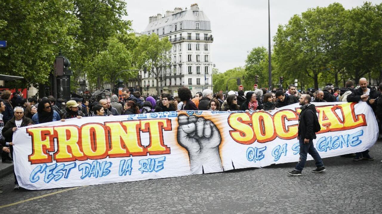 Unions, students march in Paris the day after Macron victory