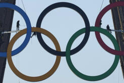 Olympic rings mounted on Eiffel Tower with 50 days to go until Paris ...