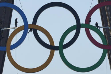 Olympic rings mounted on Eiffel Tower with 50 days to go until Paris ...