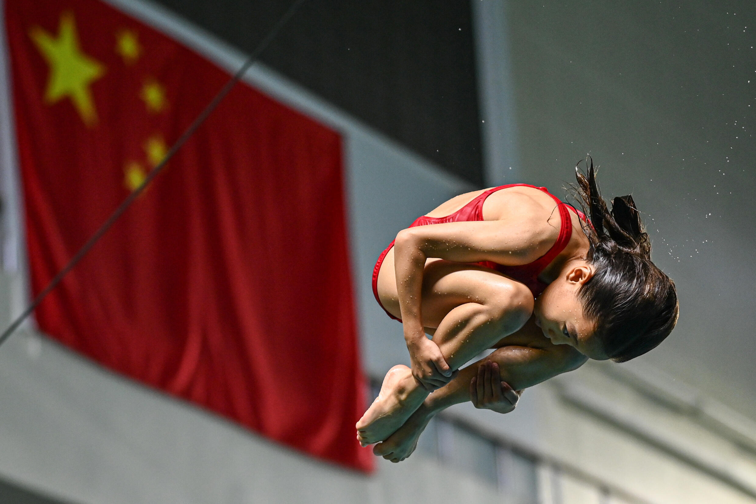 China's Olympic divers inspire next generation at Beijing pool