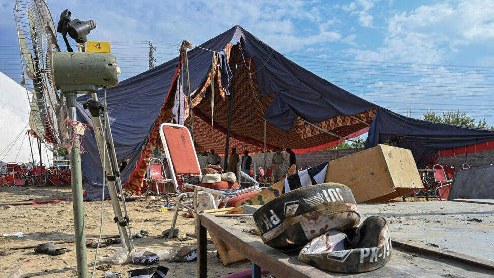 Empty seats, discarded shoes remain after Pakistan bomb kills 47