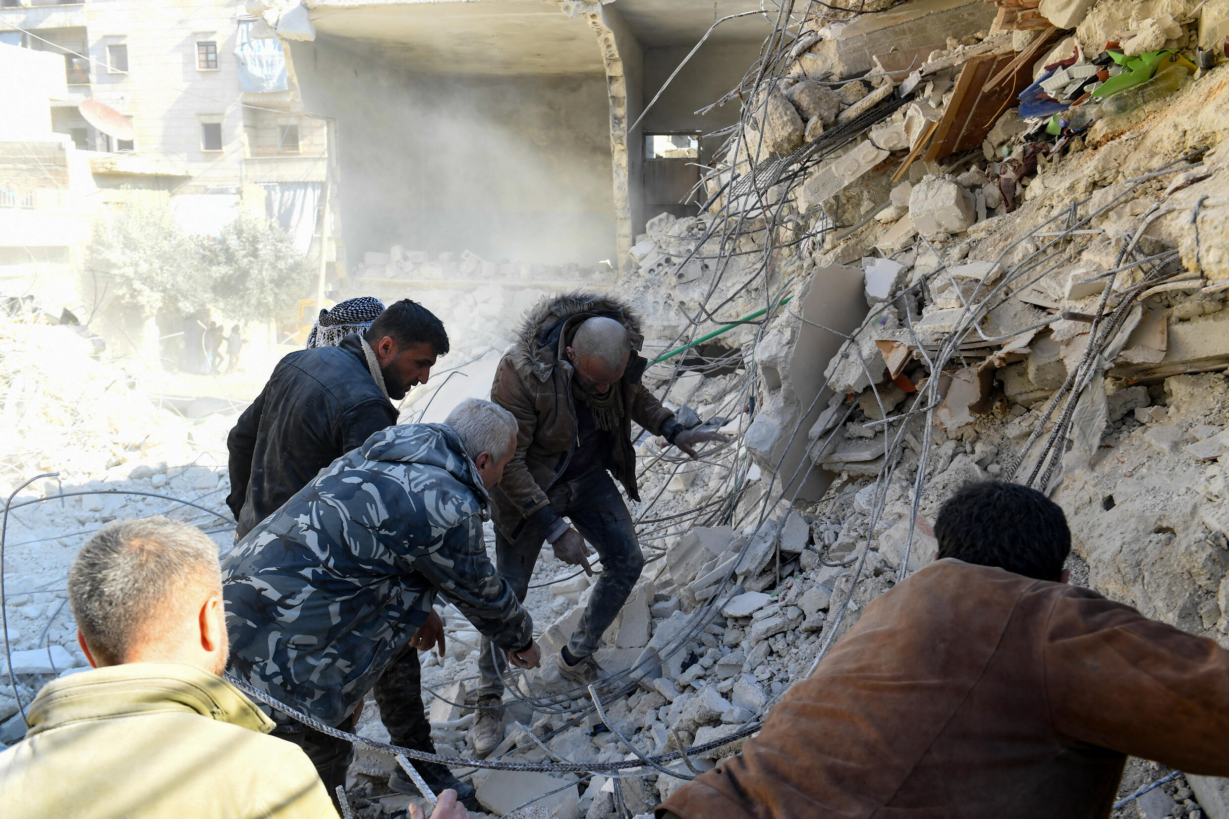 Building collapse in war-damaged Syria city kills 16