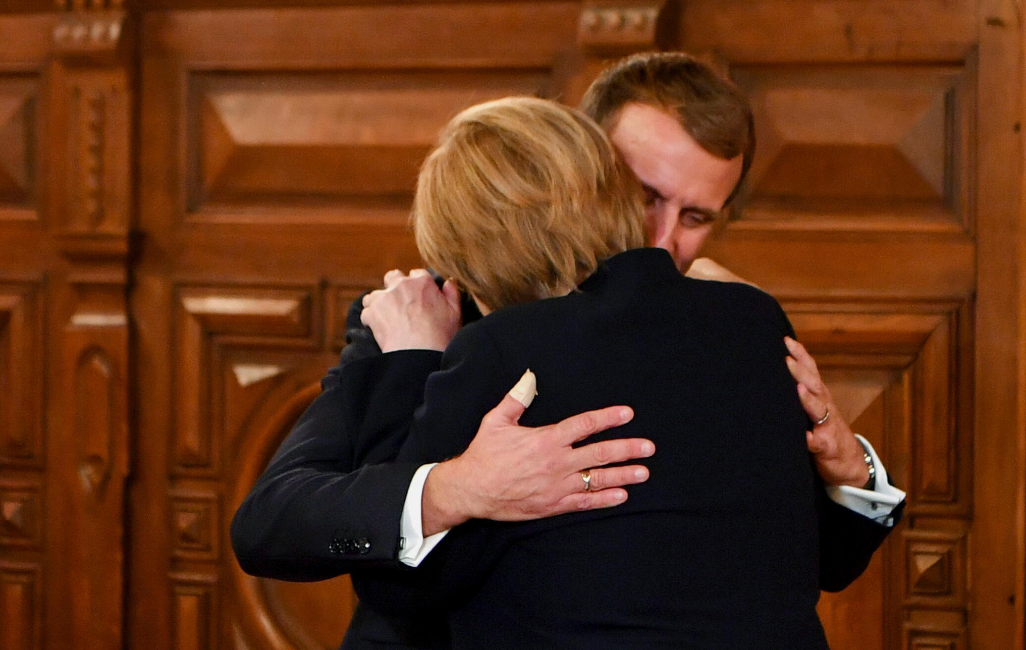 Macron thanks Merkel for 'keeping Europe united' in last toast