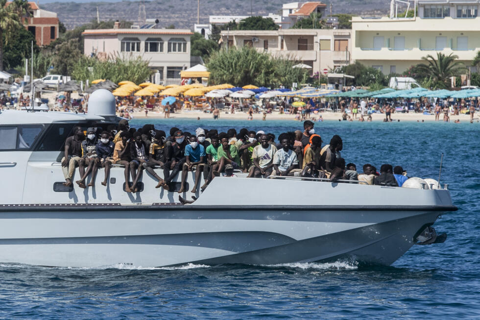 Migrant pressure eases on Italian island as political tensions rise