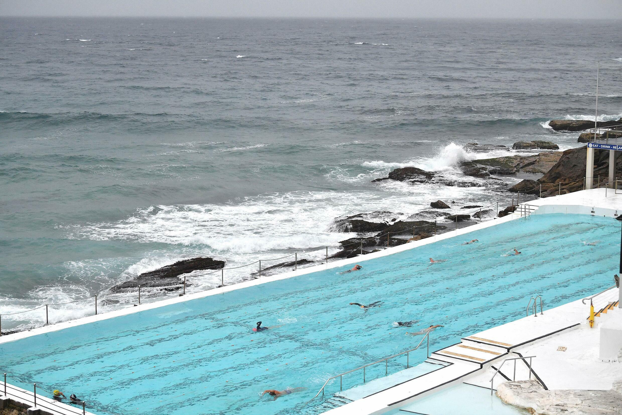 Rain-sodden Sydney ends lockdown after 106 days - France 24