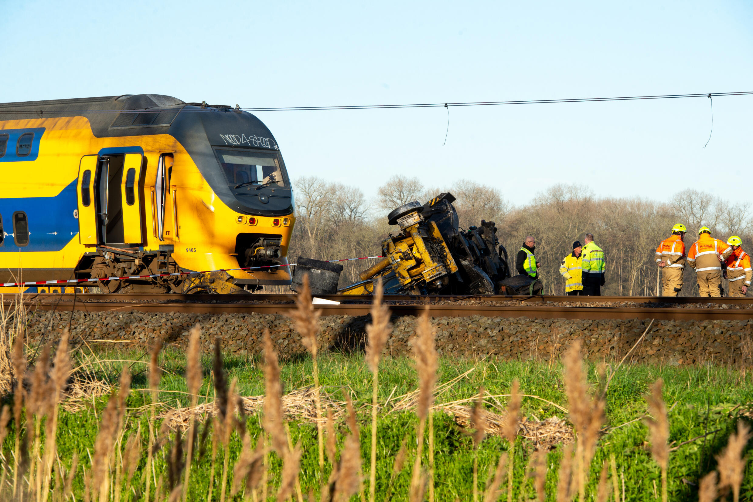 One dead after Dutch train hits crane