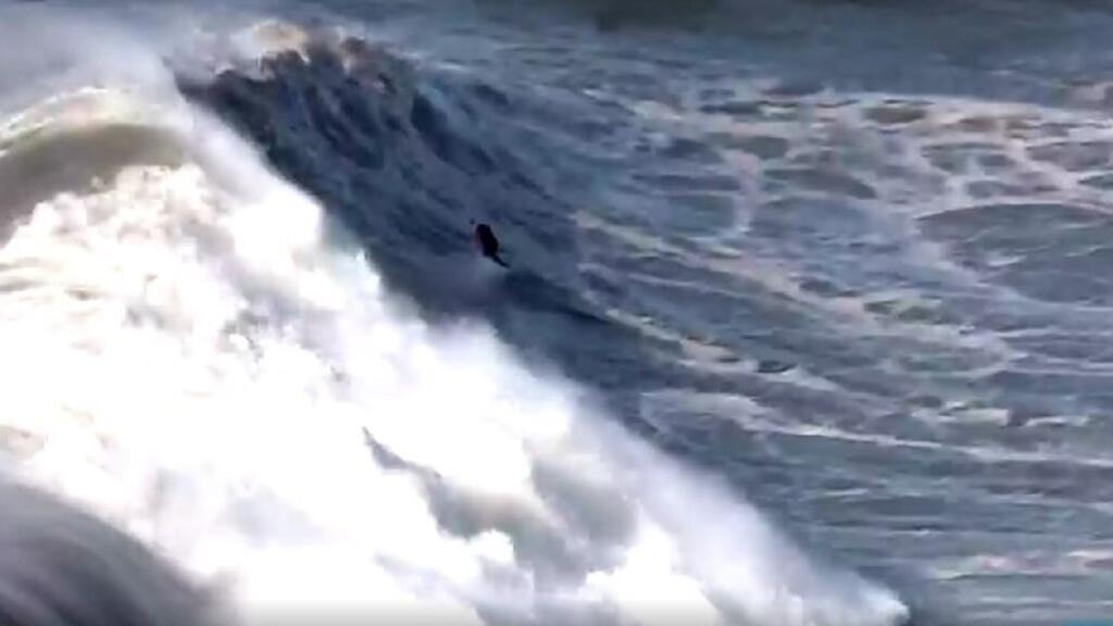 Surfers chase 'monster waves' in the Portuguese seaside town, Nazaré
