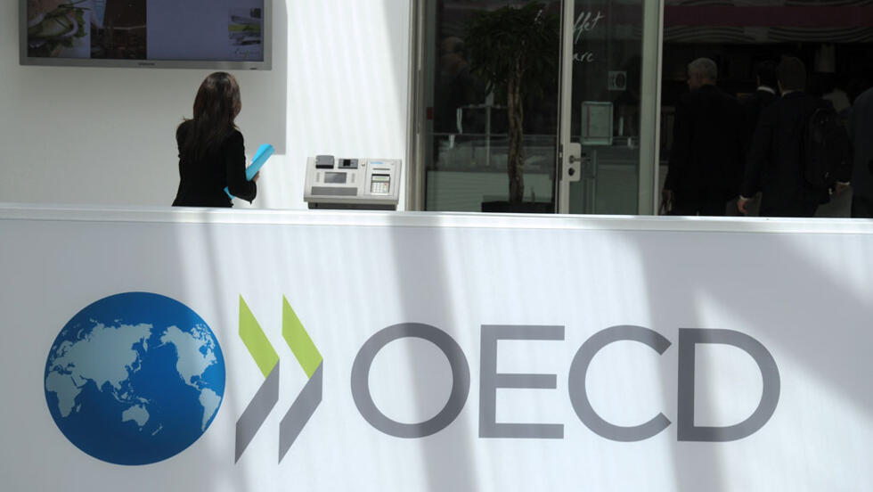 OECD lowers growth forecast for global economy