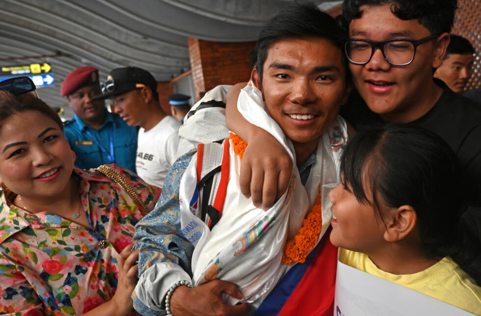 Nepali teenager hailed as hero after climbing world's 8,000m peaks