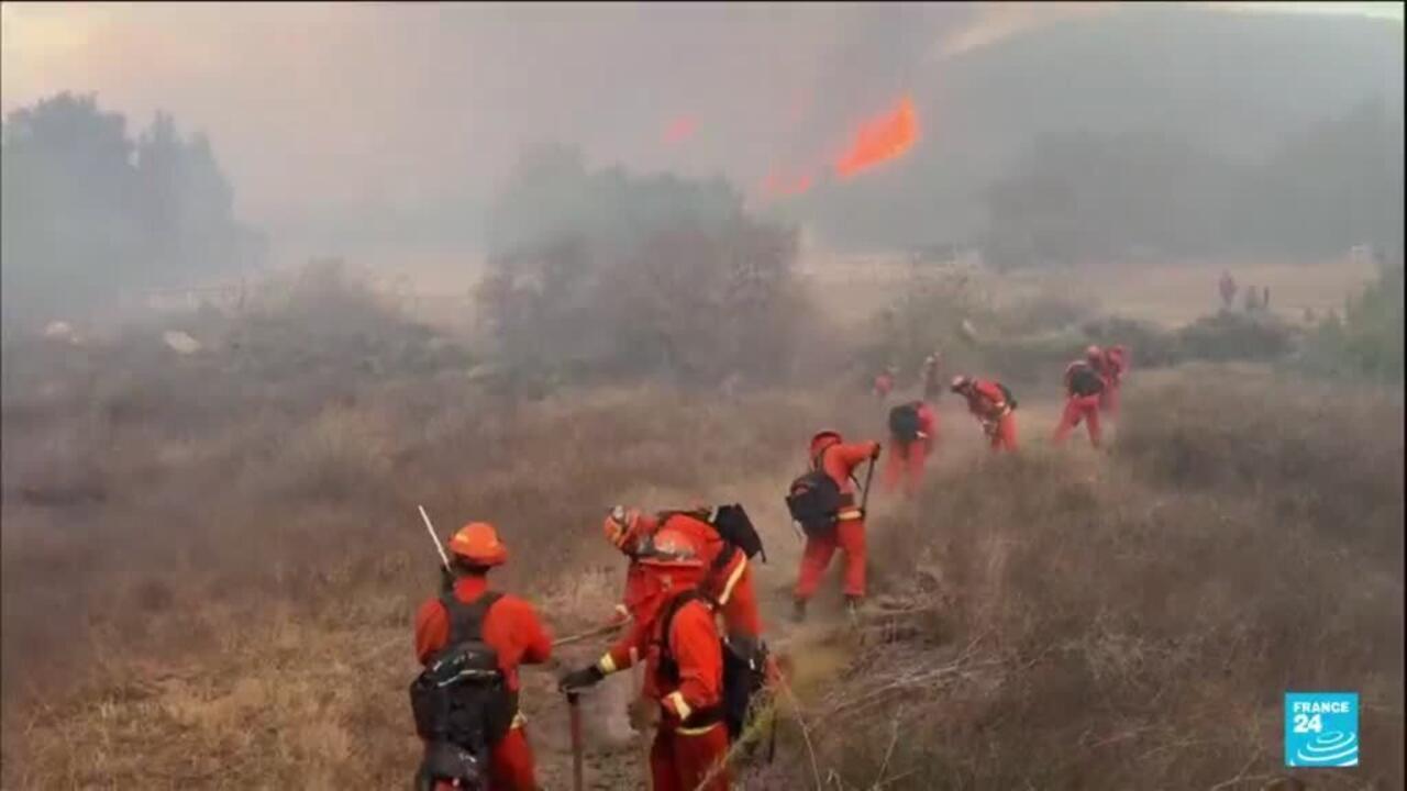 Firefighters gaining control over devastating wildfire near Los Angeles ...