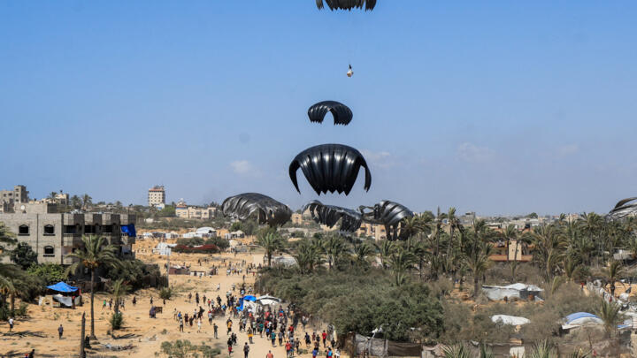 The week in pictures: Aid drops over Gaza, tsunami warnings and Ozzy ...