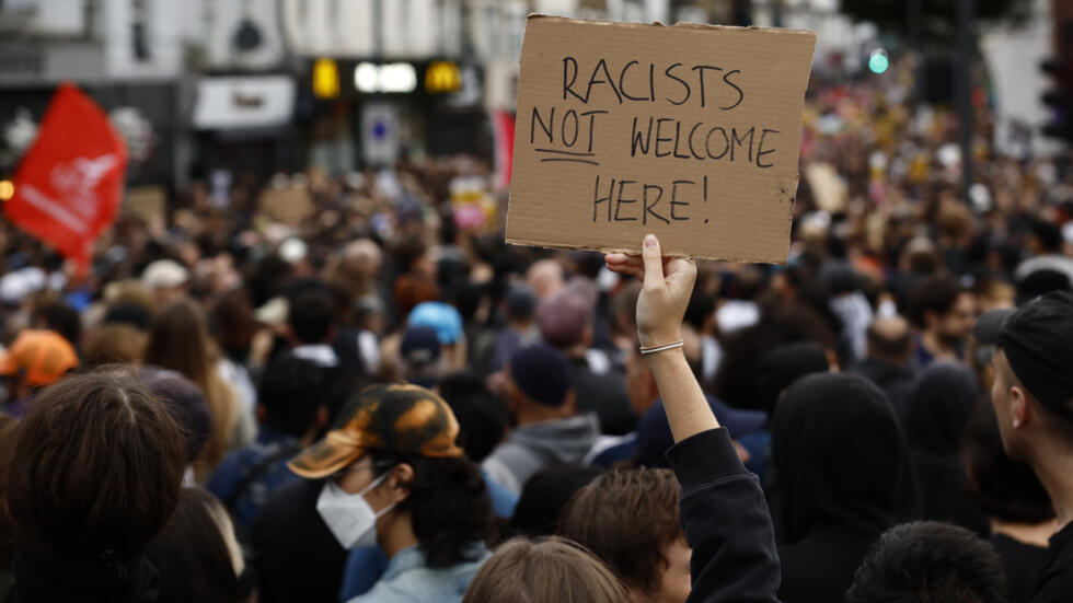 Thousands rally across UK against rise in far-right violence