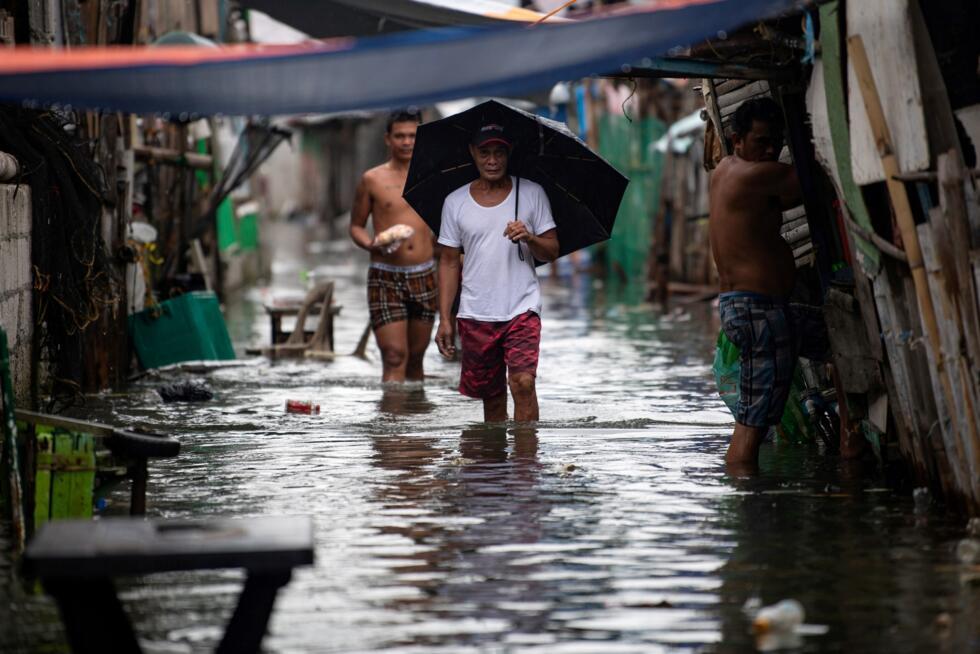Against the tide: Filipinos battle rising sea on sinking island