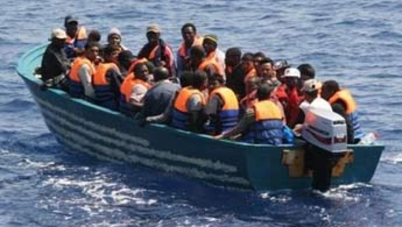 France wins EU support on immigration pact