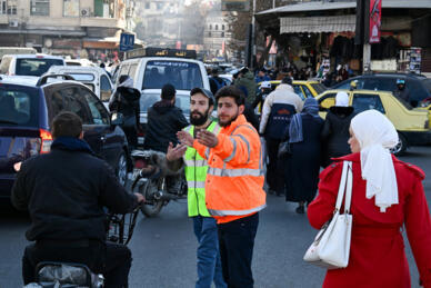 When Damascus traffic cops fled, volunteers stepped in