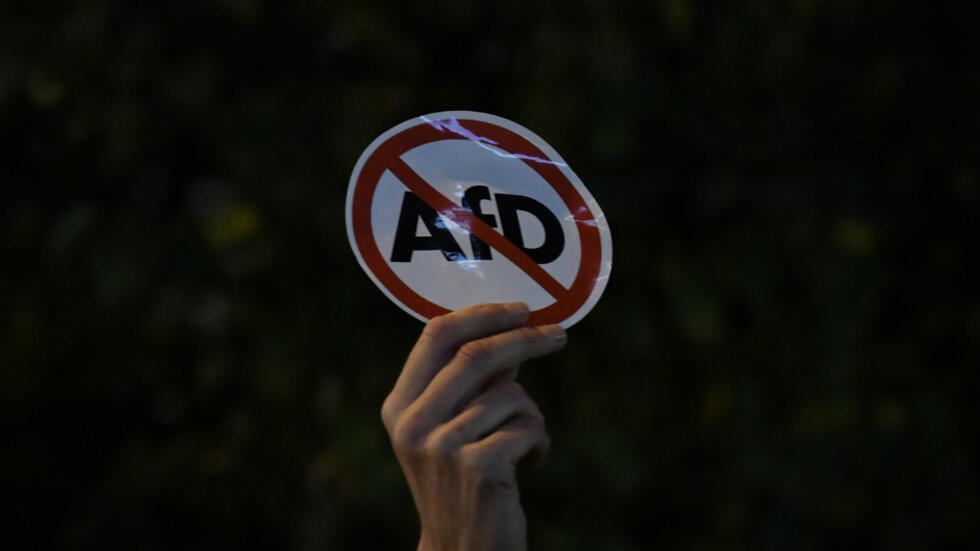 Germany's Merkel squeezed by populists' rise at the ballot box